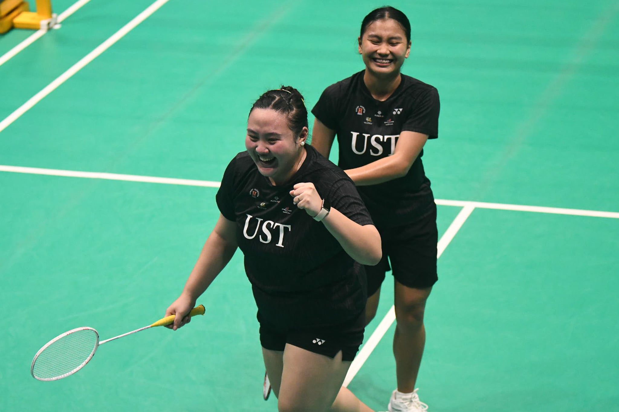 UST Lady Shuttlers stamp semis ticket with playoff win over DLSU - The Flame